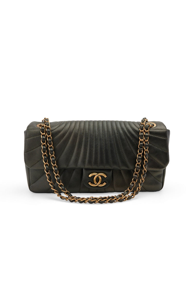 Pre-loved Chanel Wave Stitch Flap Bag – Audrey's of Naples