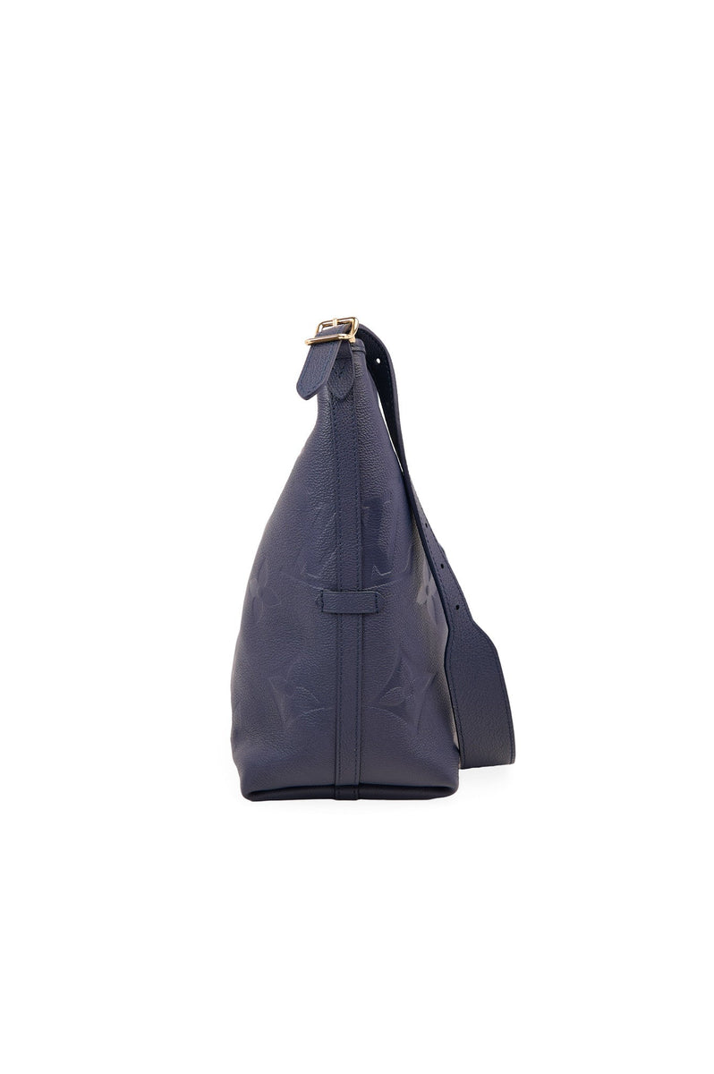 Pre-loved Louis Vuitton Carryall MM – Audrey's of Naples